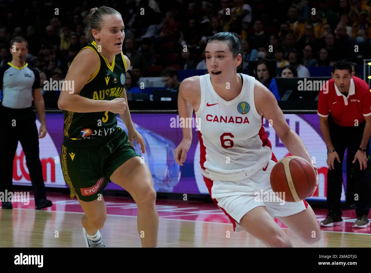 Canada's Bridget Carleton runs past Australia's Kristy Wallace, left ...