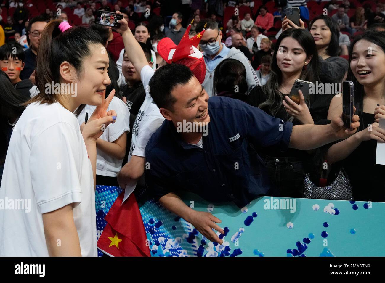 China's Li Meng poses for a selfie for fans following during their game ...