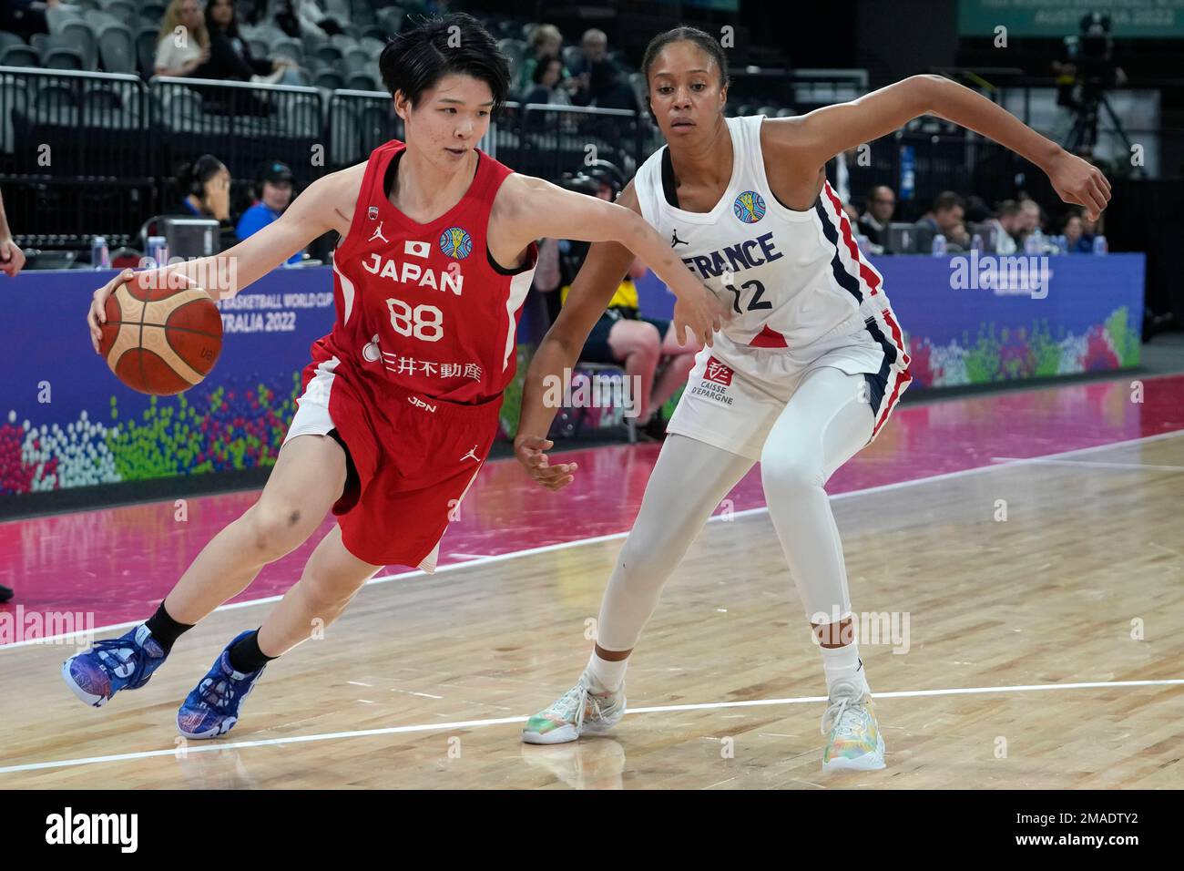 Japan's Himawari Akaho, left, goes around France's Iliana Rupert during ...