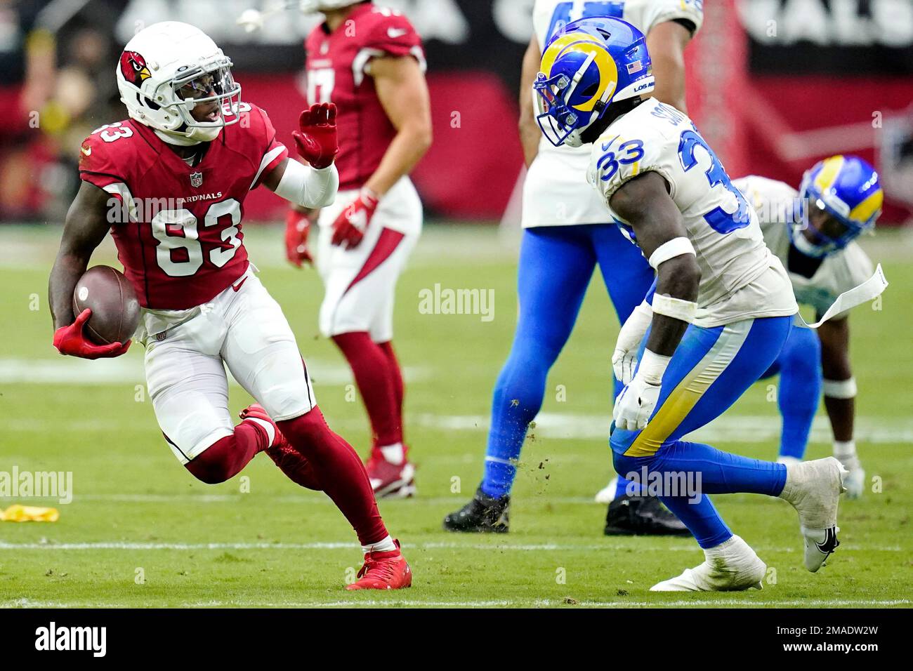 Arizona Cardinals wide receiver Greg Dortch (83) tries to elude Los ...