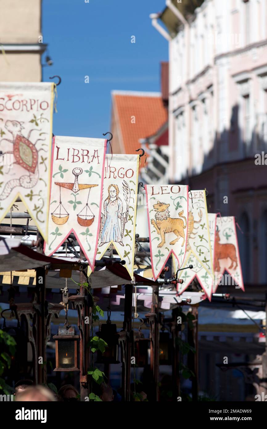Estonia, Tallinn, medieval banners showing star signs Stock Photo - Alamy