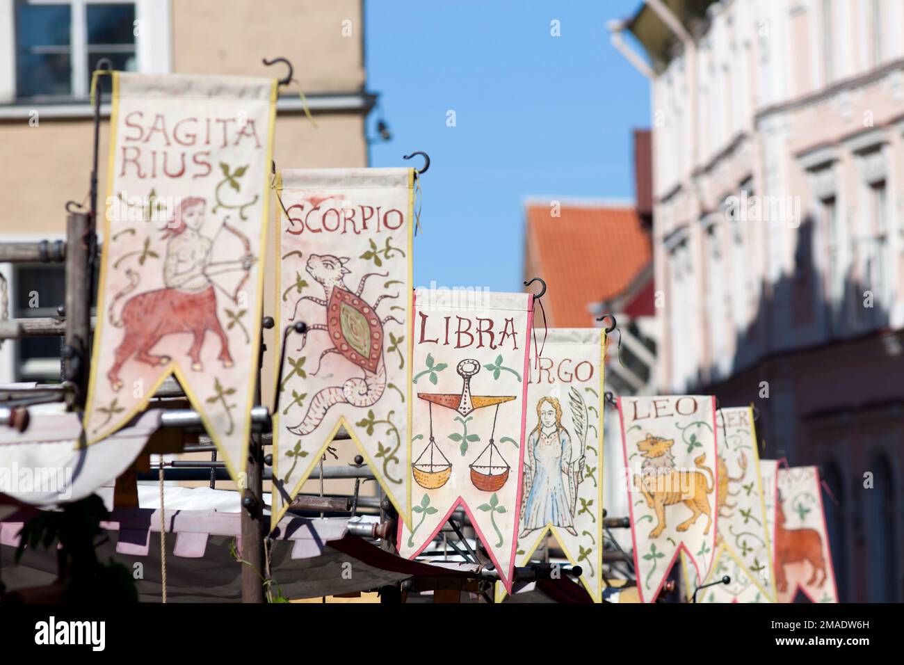 Estonia, Tallinn, medieval banners showing star signs Stock Photo - Alamy
