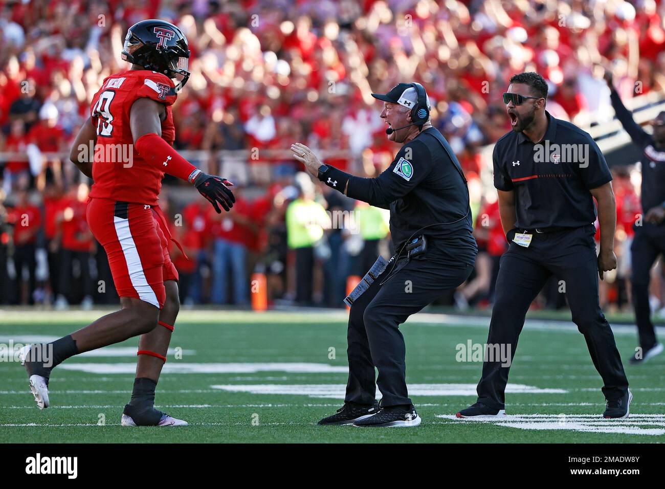 Texas Tech defensive coordinator Tim DeRuyter celebrates with Tyree ...