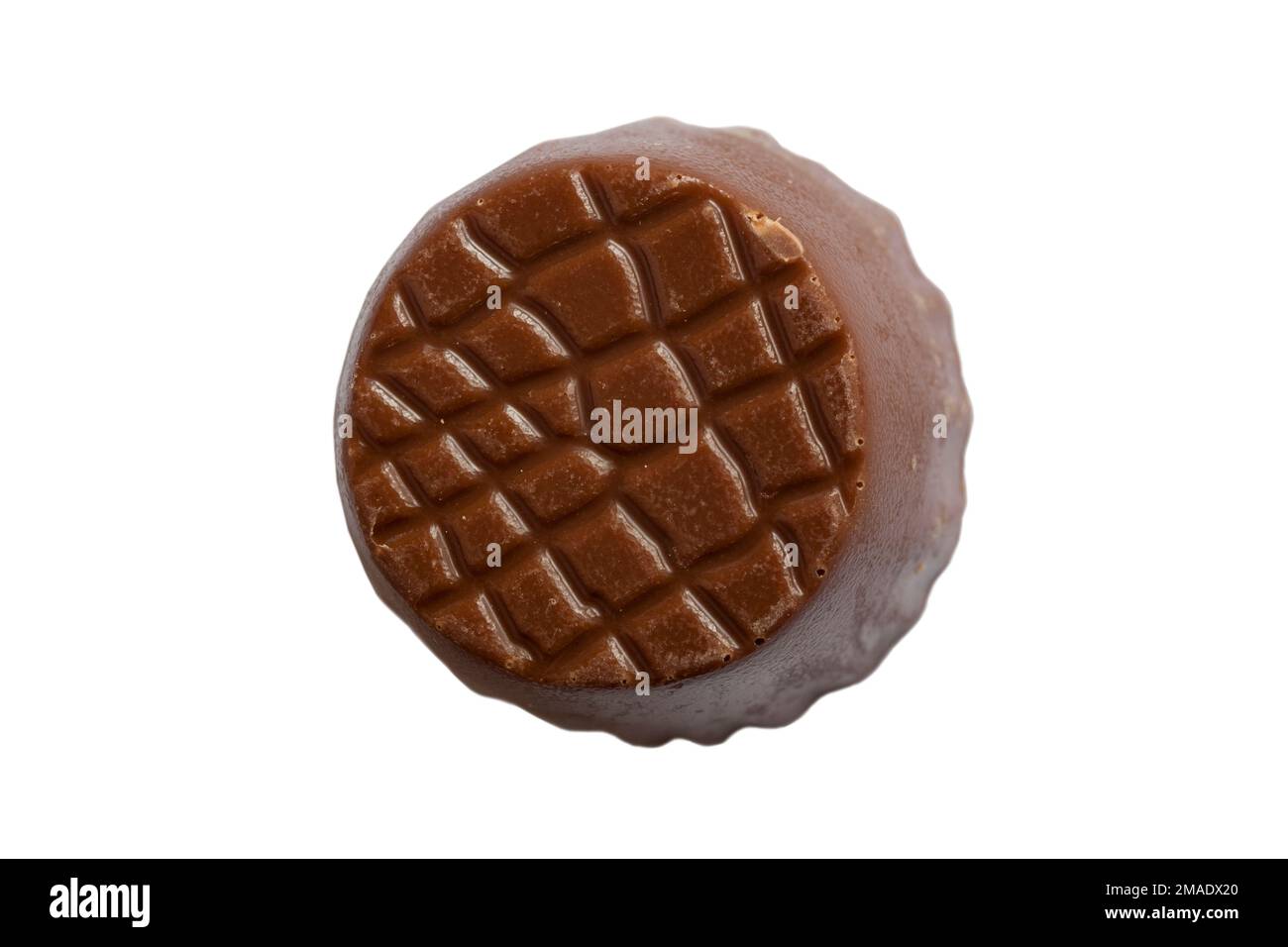 Tangy passion fruit flavoured filling in a milk chocolate shell hi-res ...