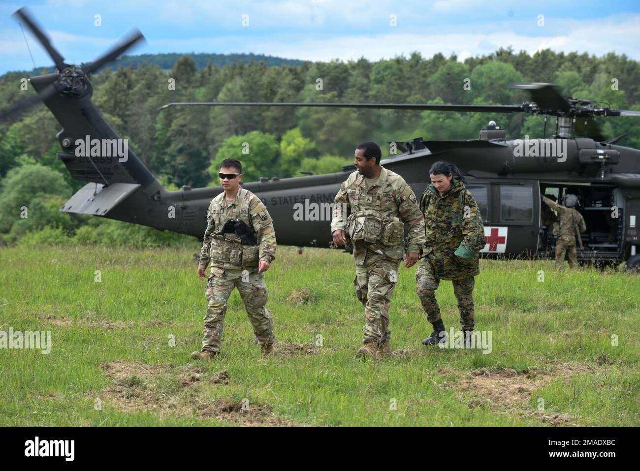 U.S. Army Soldiers and a Bosnian soldier prepare for a medical ...