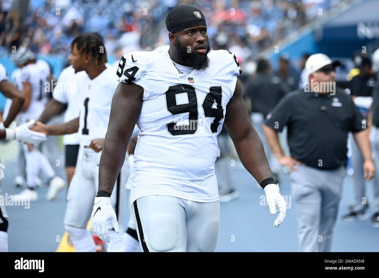 Las Vegas Raiders defensive end Jordan Jenkins (94) walks on the ...