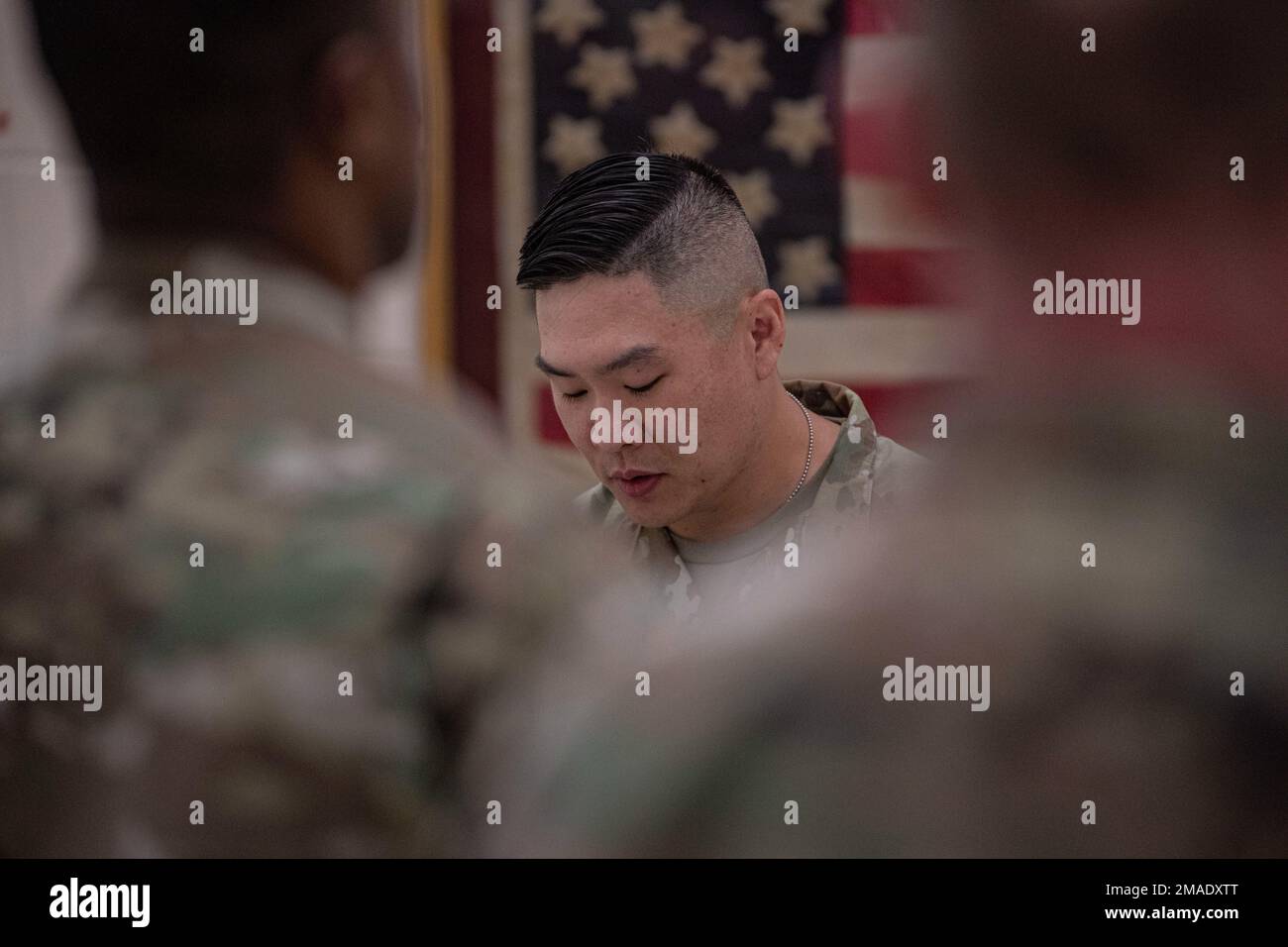 U.S. Army Chaplain Candidate 1st Lt. Daniel Yang gives the invocation ...