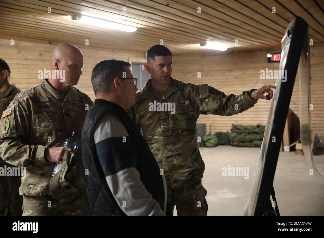 U.S. Army Maj. Ryan McCann, assigned to the 119th Field Artillery Regiment of the Michigan Army ...