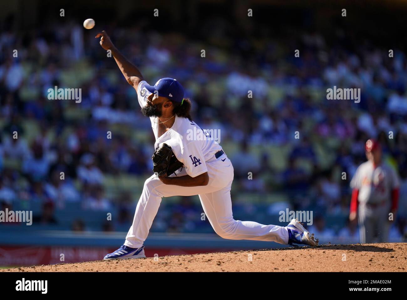 Los Angeles Dodgers relief pitcher Andre Jackson throws against the St ...