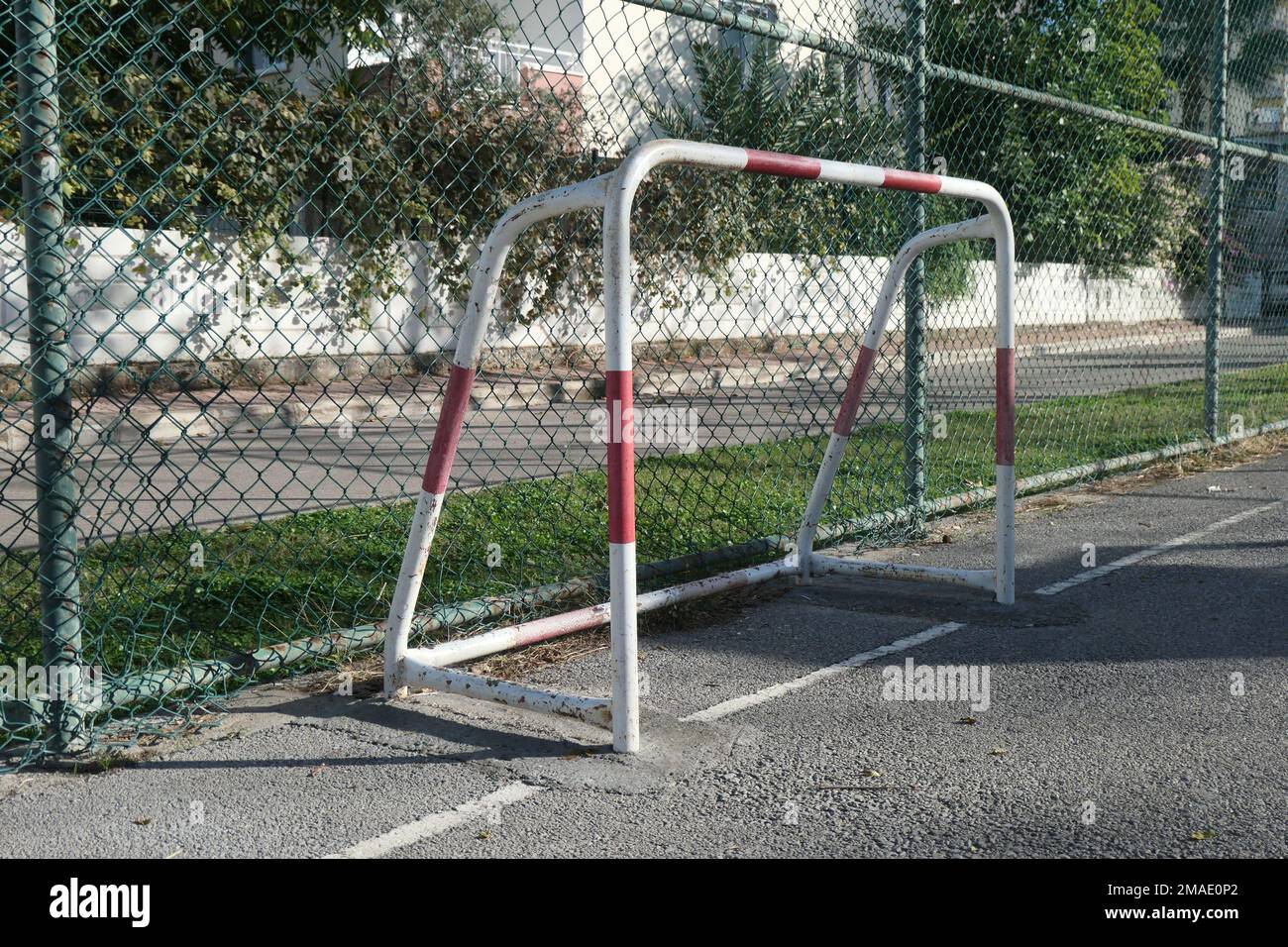 Goalposts standing in the children's playground Stock Photo - Alamy