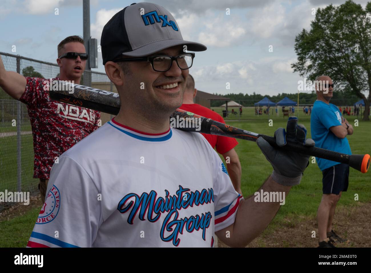 Air Mobility Command members, friends and families participate in a ...