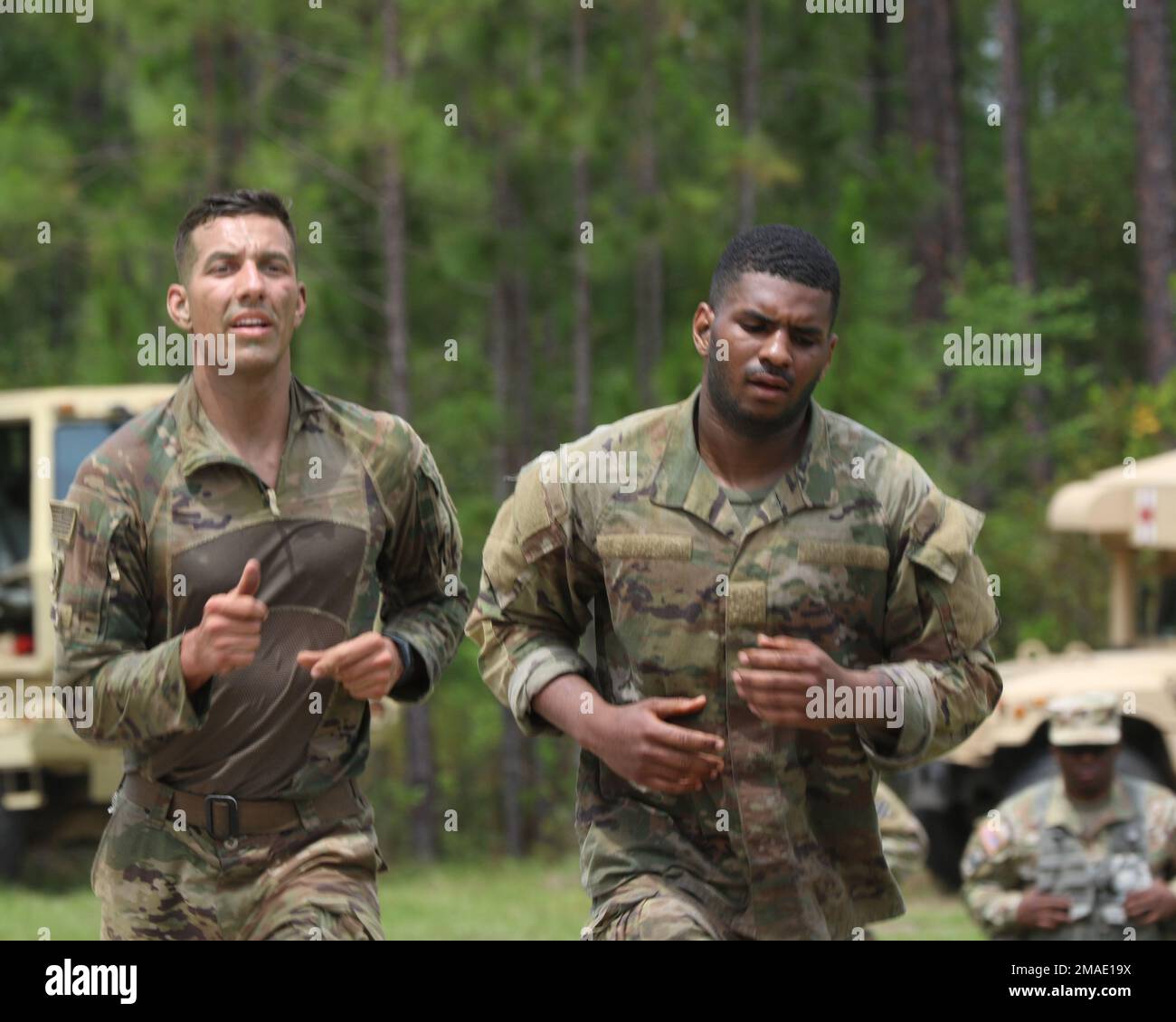Sgt. 1st. Class Mk-Ada-Quet Genereaux and Spc. Justin Brown, assigned ...