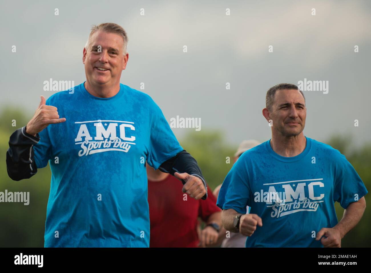 Air Mobility Command members, friends and families participate in a ...