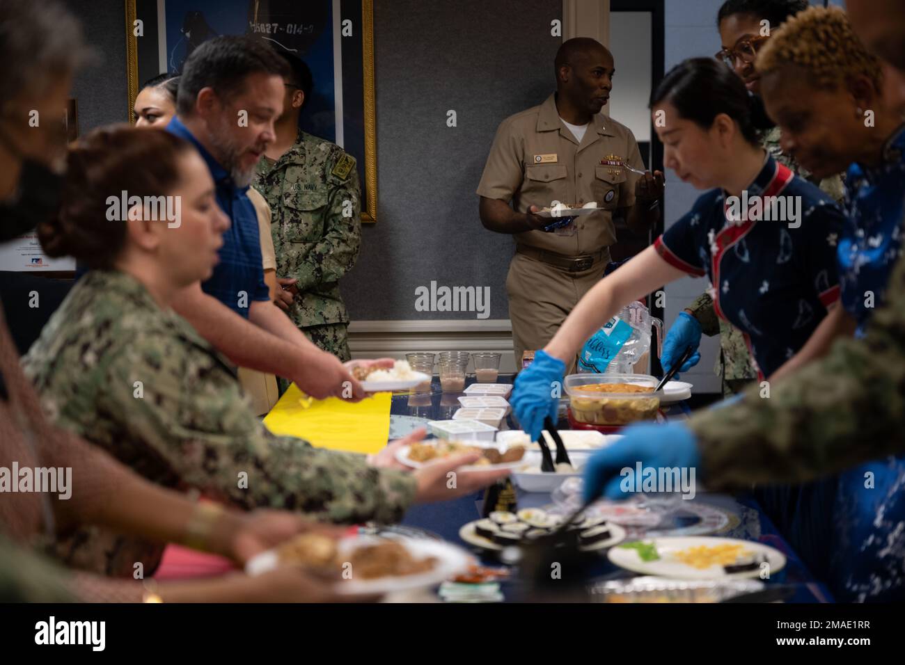 Sailors and civilian personnel at Commander, Navy Recruiting Command ...