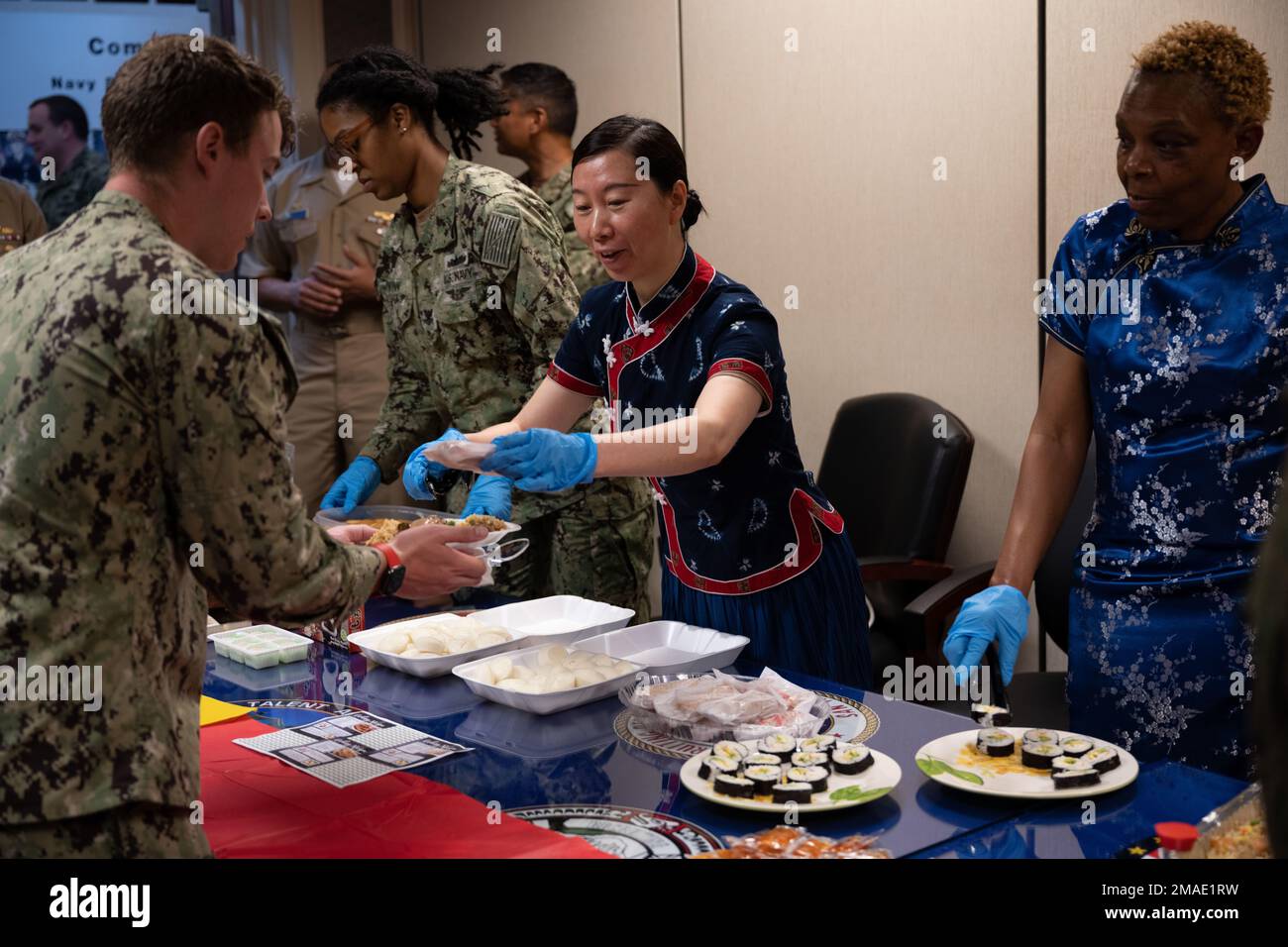 Sailors and civilian personnel at Commander, Navy Recruiting Command ...