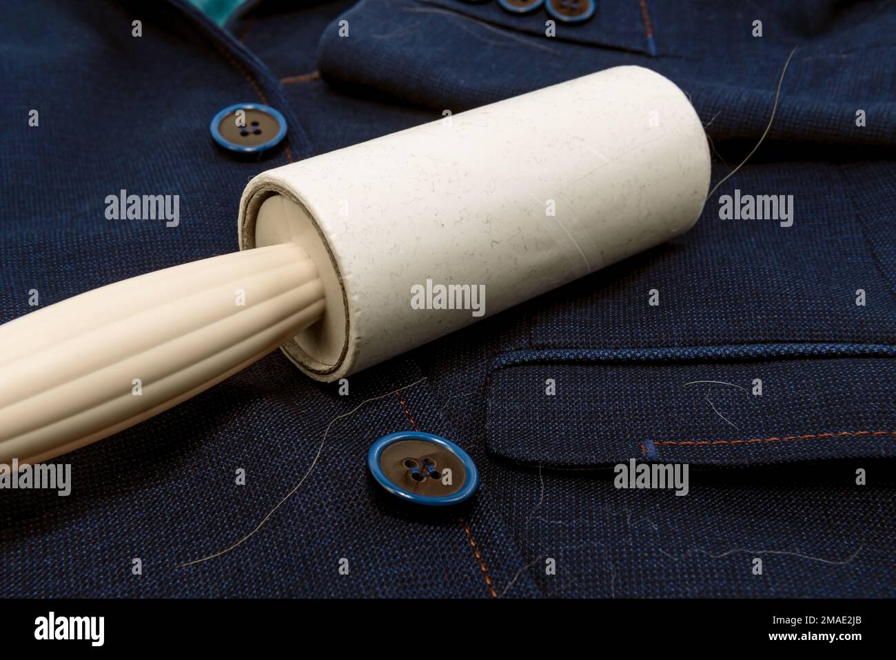 Roller for cleaning clothes from dust, debris and dirt. Clothing care ...