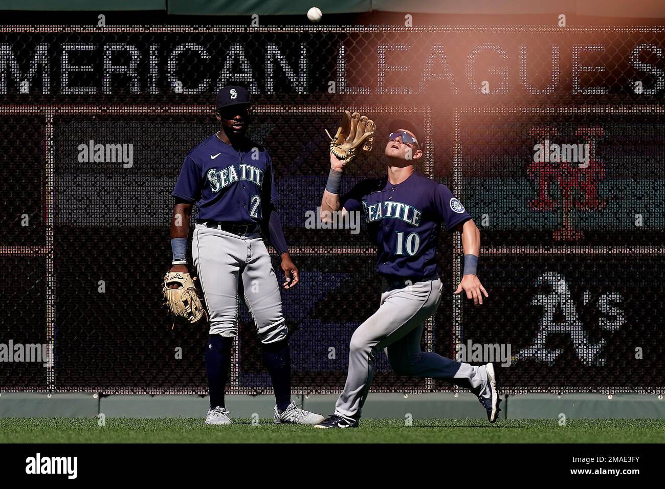 Seattle Mariners center fielder Jarred Kelenic catches a fly ball for ...