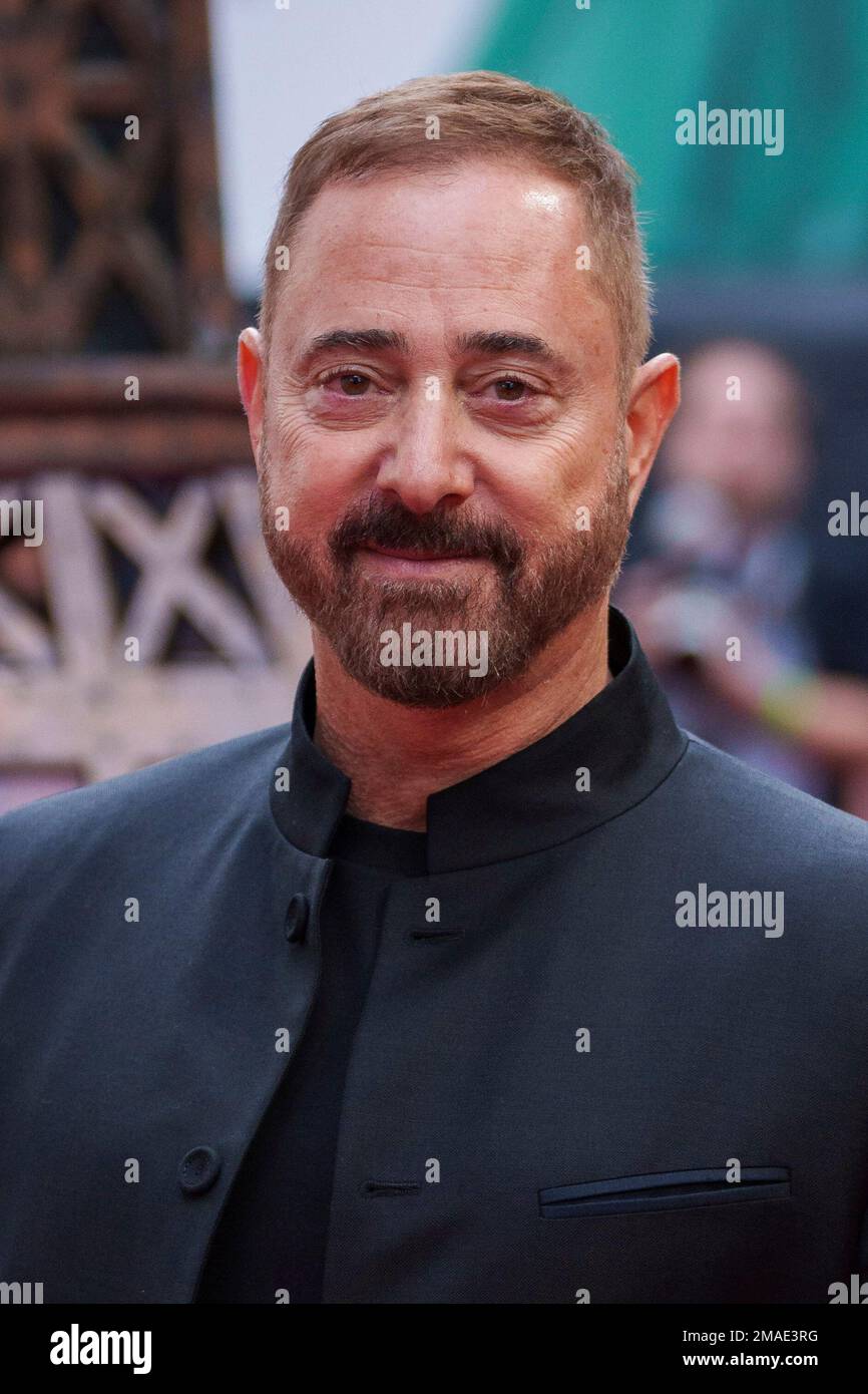 Anthony Fabian poses for photographers upon arrival for the UK premiere of the film 'Mrs Harris ...