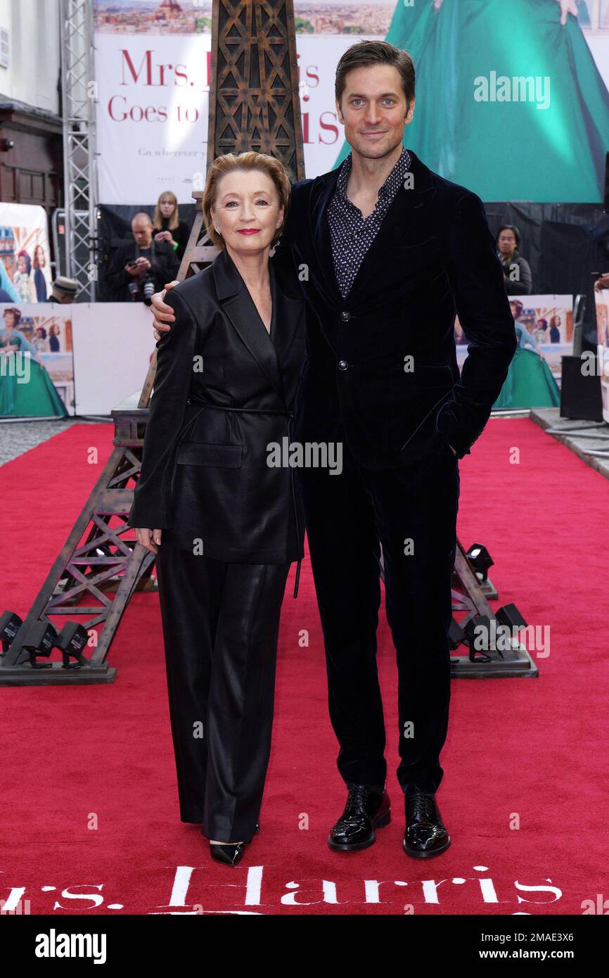 Lesley Manville, left, and Lucas Bravo pose for photographers upon ...