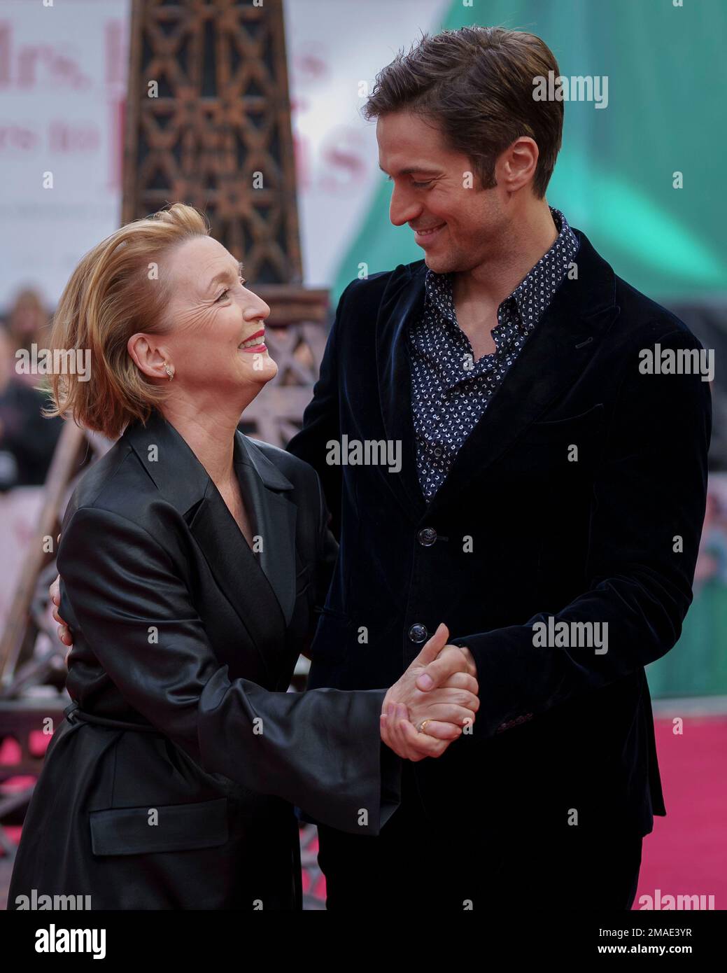 Lesley Manville, left, and Lucas Bravo pose for photographers upon ...