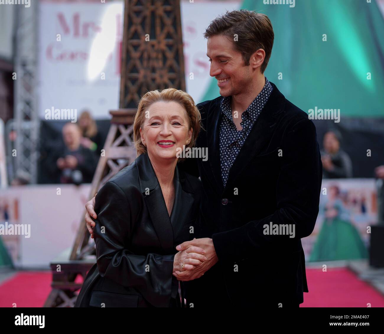 Lesley Manville, left, and Lucas Bravo pose for photographers upon ...