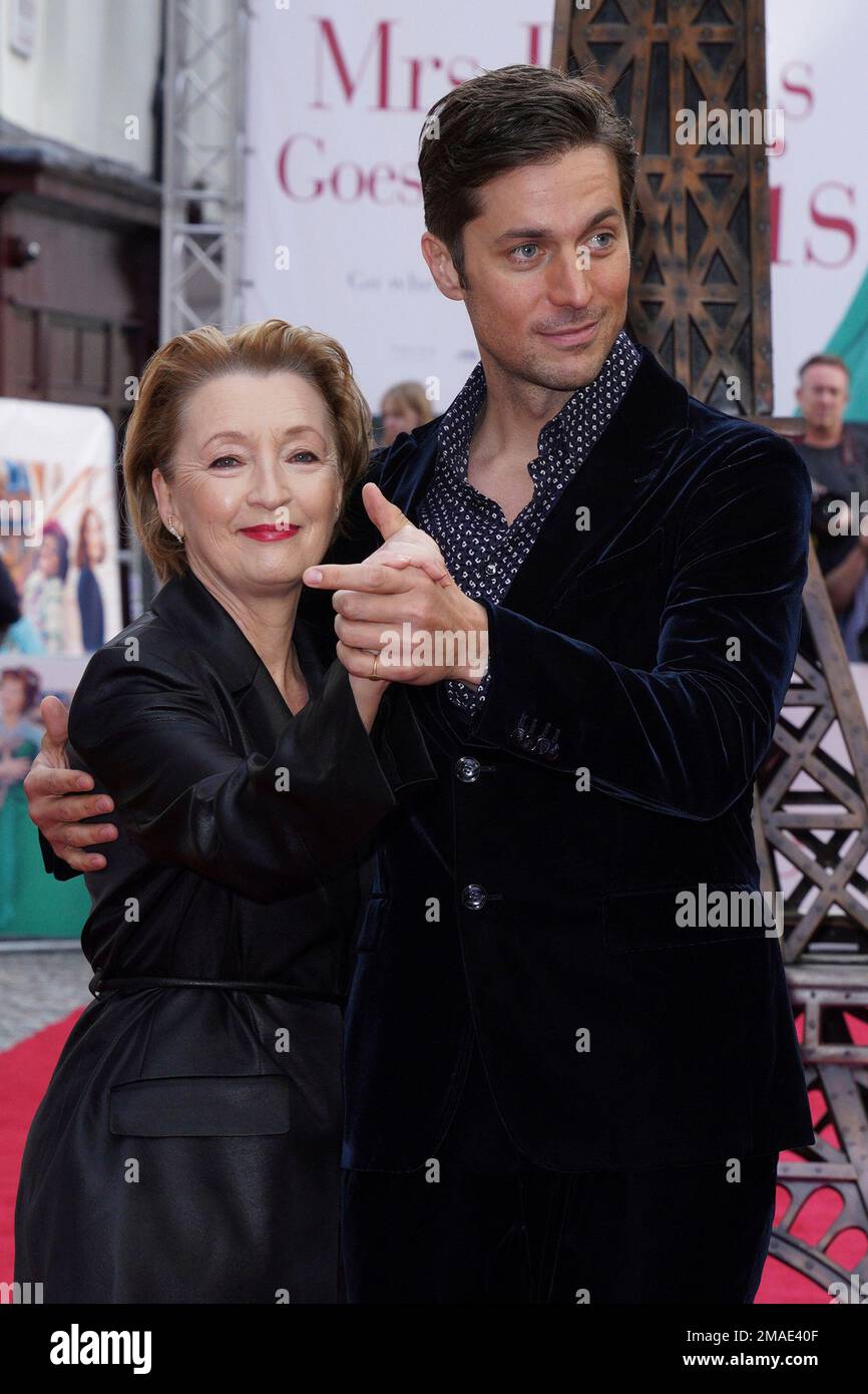 Lesley Manville, left, and Lucas Bravo pose for photographers upon ...