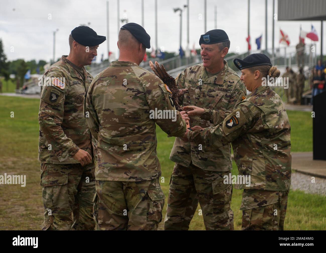 Maj. Gen. JP McGee, commanding general, and Command Sgt. Maj. Veronica Knapp, command sergeant ...