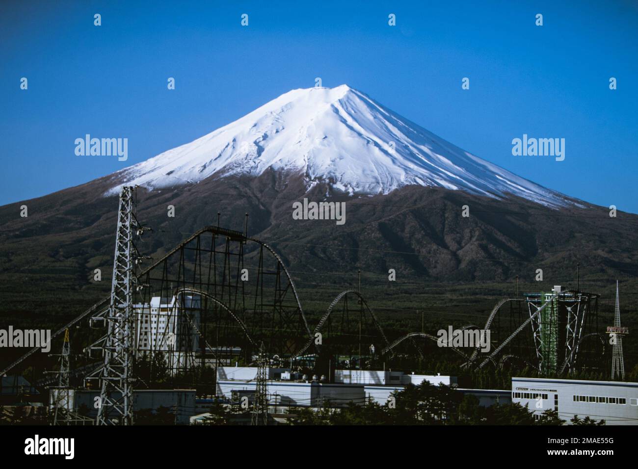 An amusement park in Japan with the beautiful Mount Fuji with snowy ...