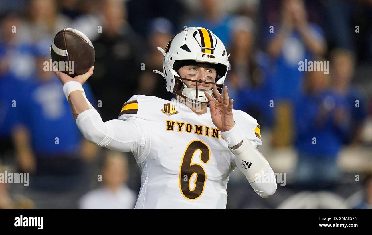 Wyoming quarterback Andrew Peasley (6) throws downfield during the ...