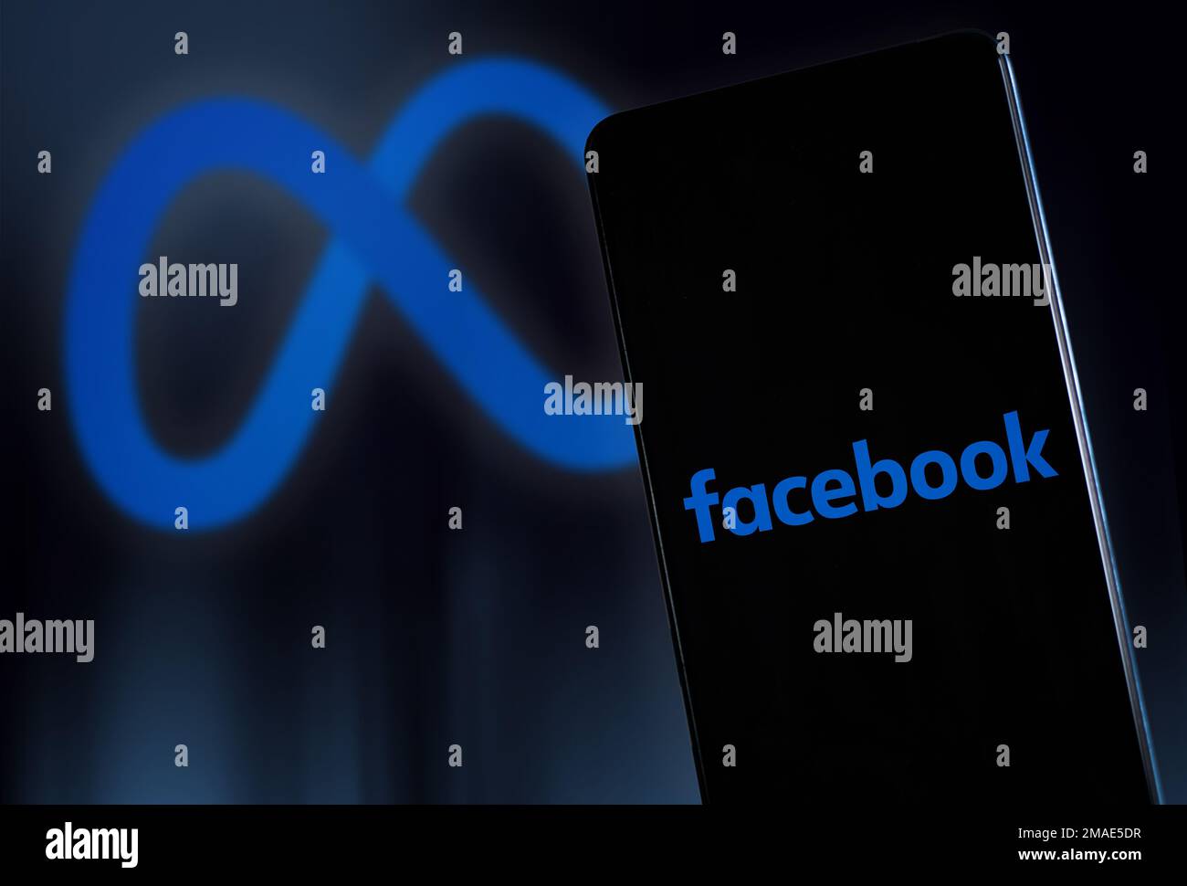 Facebook and Meta logo on smartphone and background. Social media ...