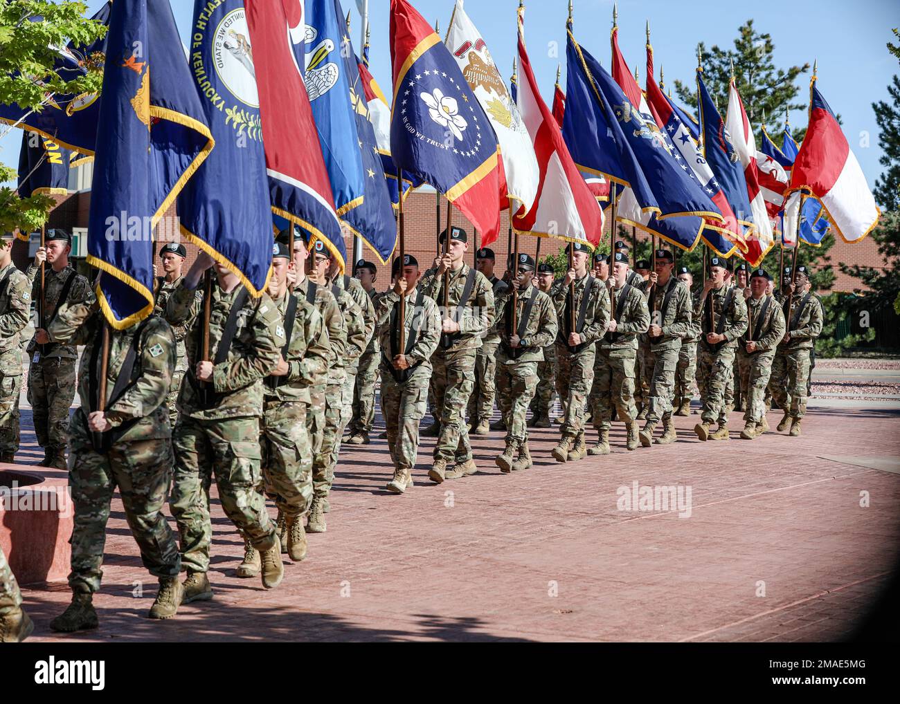 Soldiers assigned to the 4th Infantry Division and Fort Carson march as ...