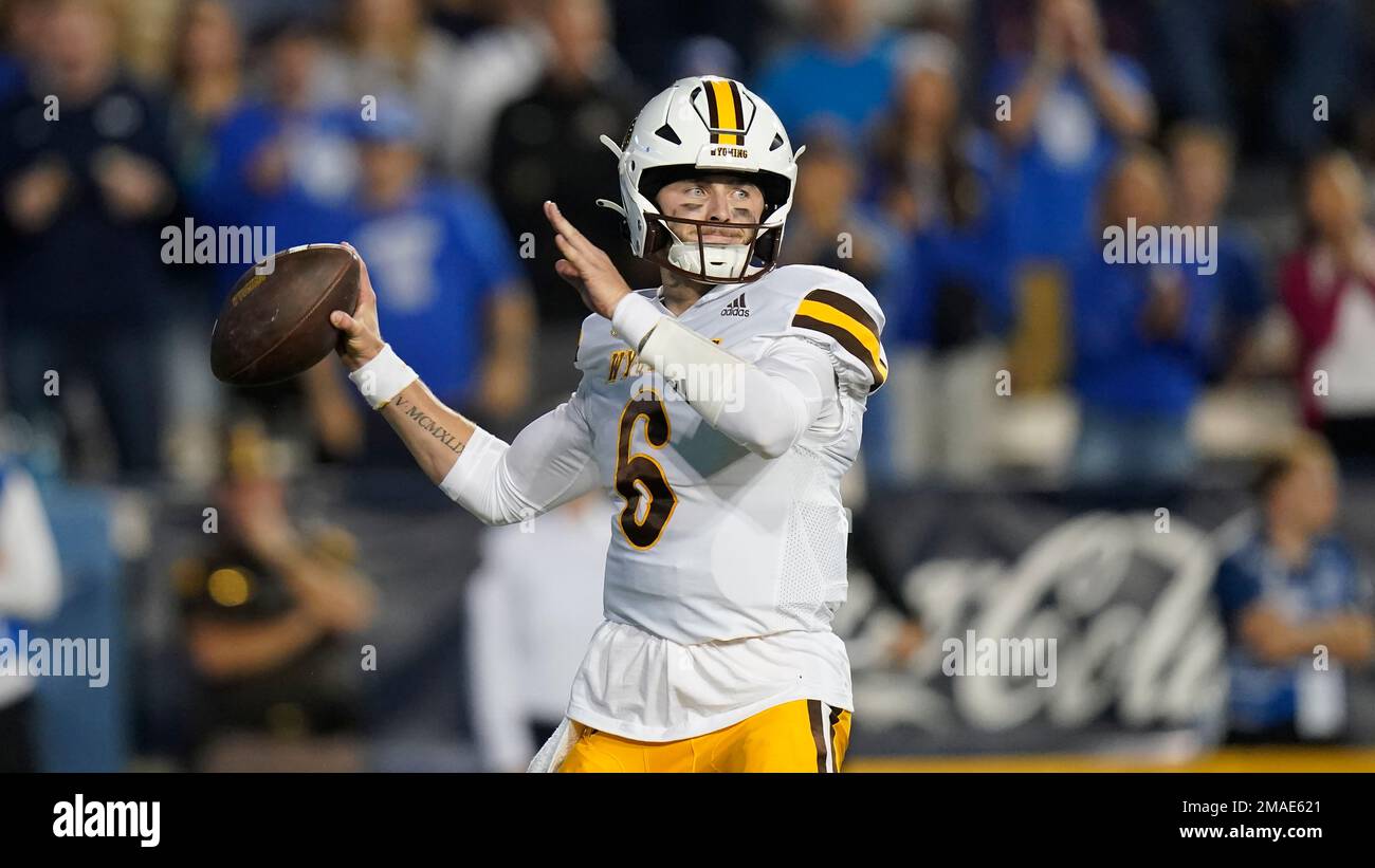 Wyoming quarterback Andrew Peasley (6) throws downfield during the ...