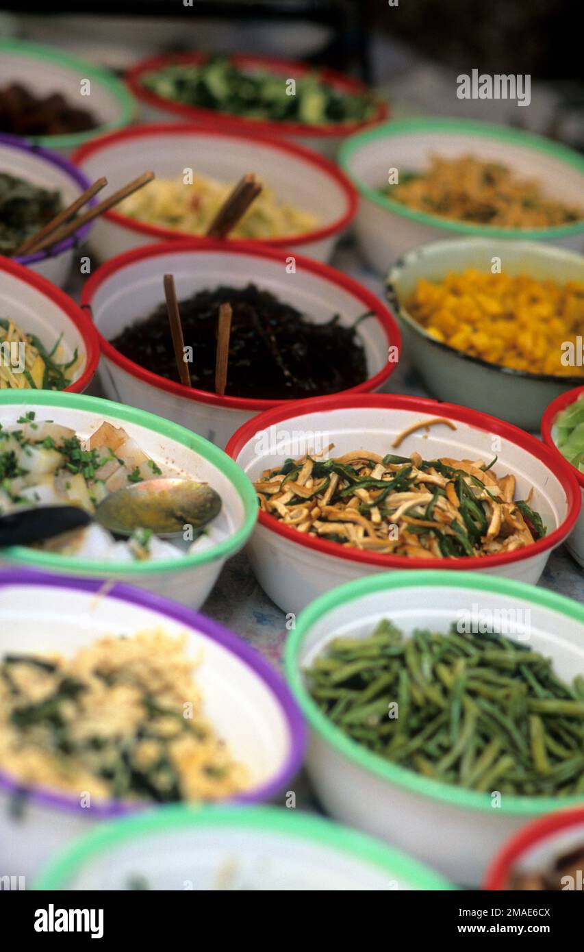 China, Shanghai, food, a mixture of prepared foods in restaurant window ...