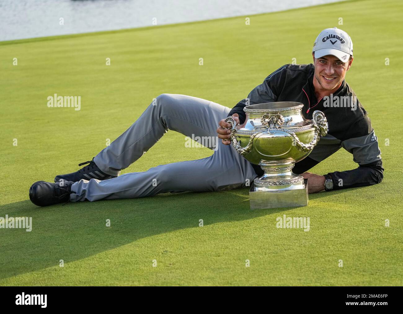 Guido Migliozzi, of Italy, poses with the trophy after he won the ...