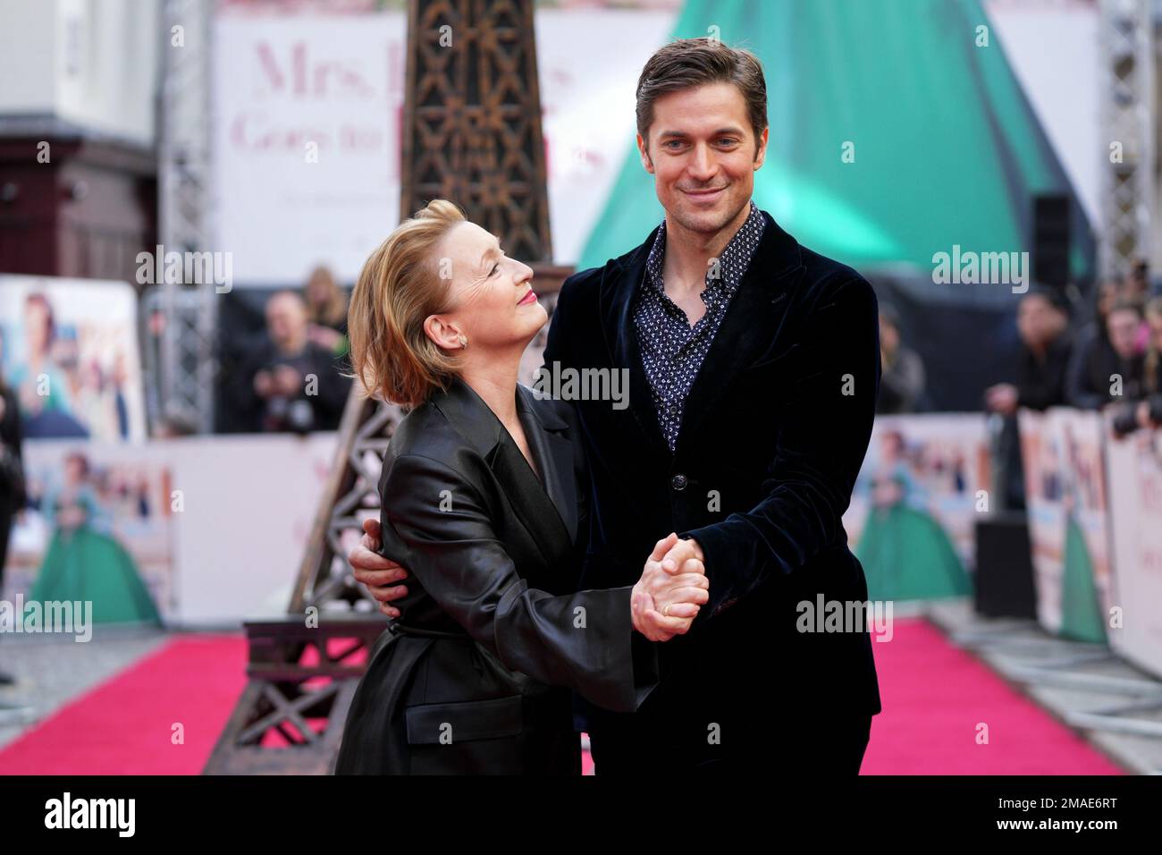 Lesley Manville, left, and Lucas Bravo pose for photographers upon ...