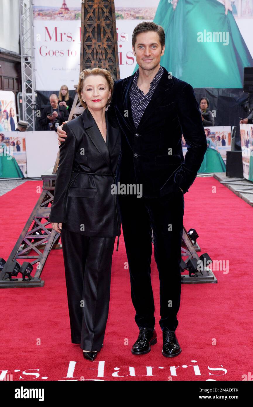 Lesley Manville, left, and Lucas Bravo pose for photographers upon ...