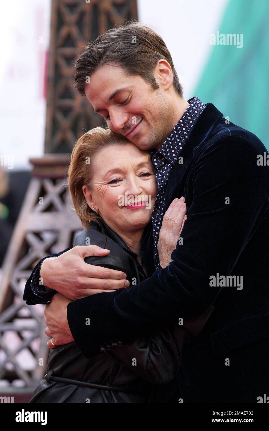 Lesley Manville, left, and Lucas Bravo pose for photographers upon ...