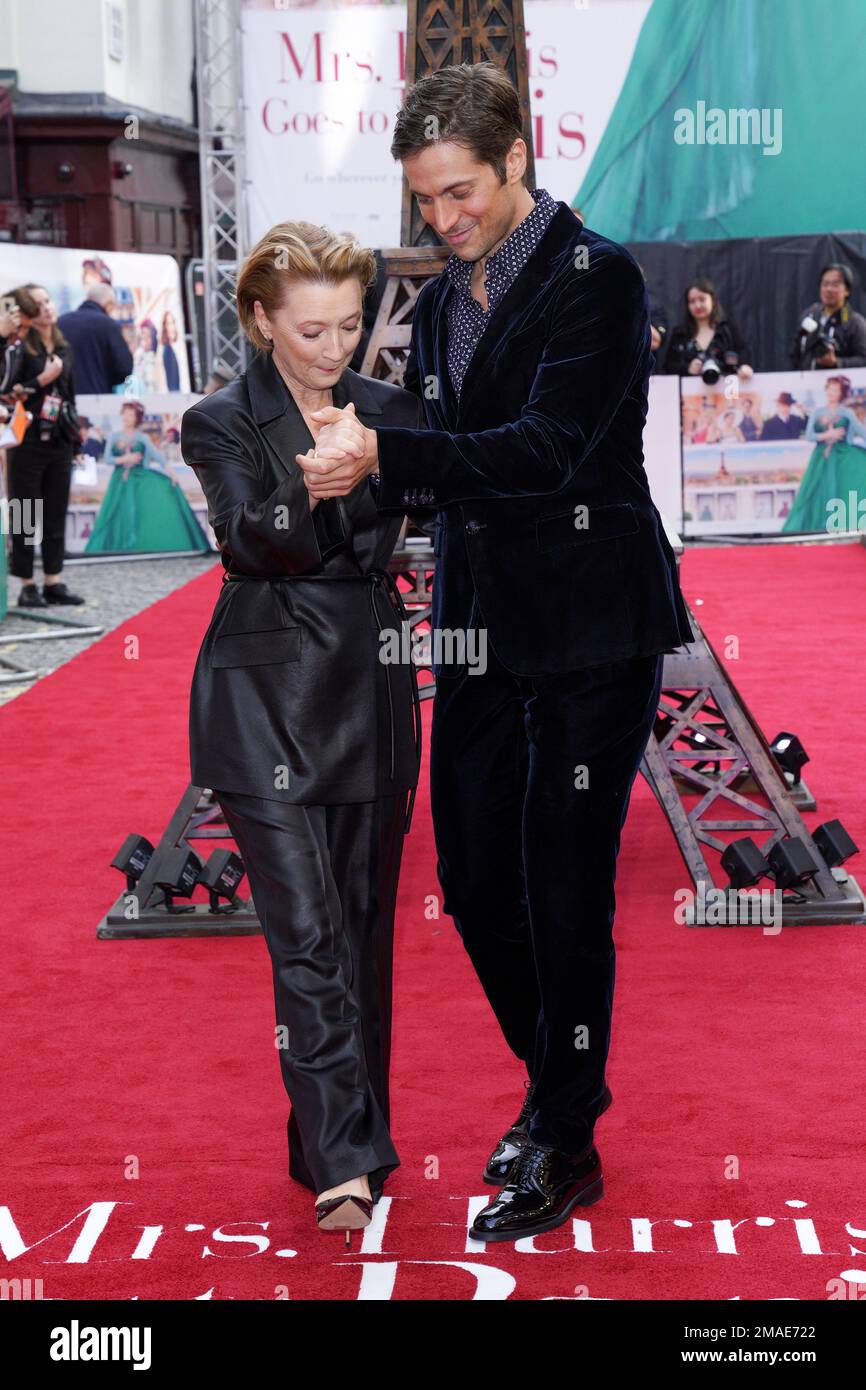 Lesley Manville, left, and Lucas Bravo pose for photographers upon ...