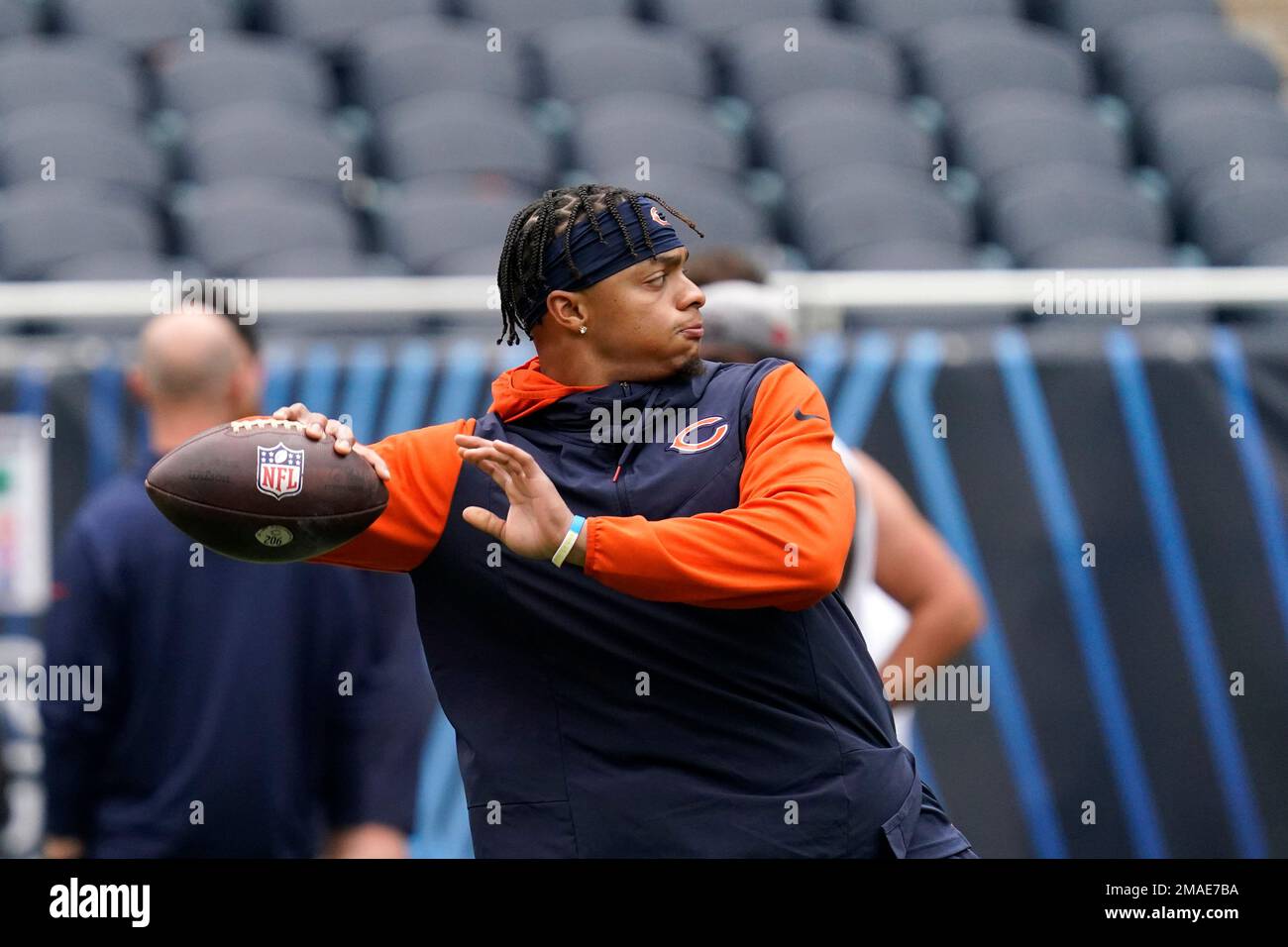 Chicago Bears quarterback Justin Fields warms up before an NFL football ...