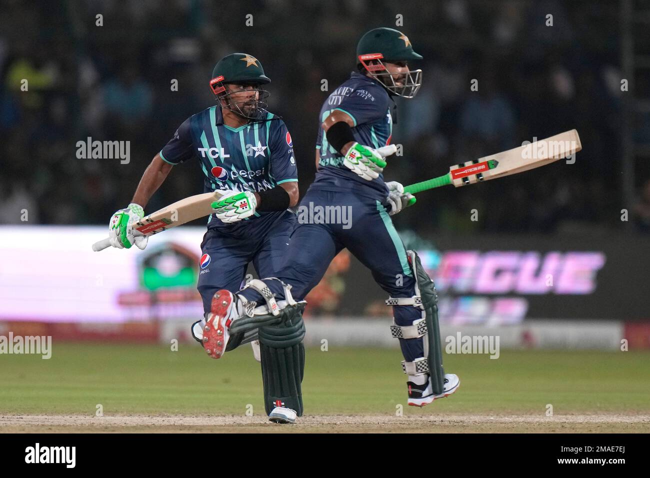 Pakistans Babar Azam Left And Batting Partner Mohammad Rizwan Run