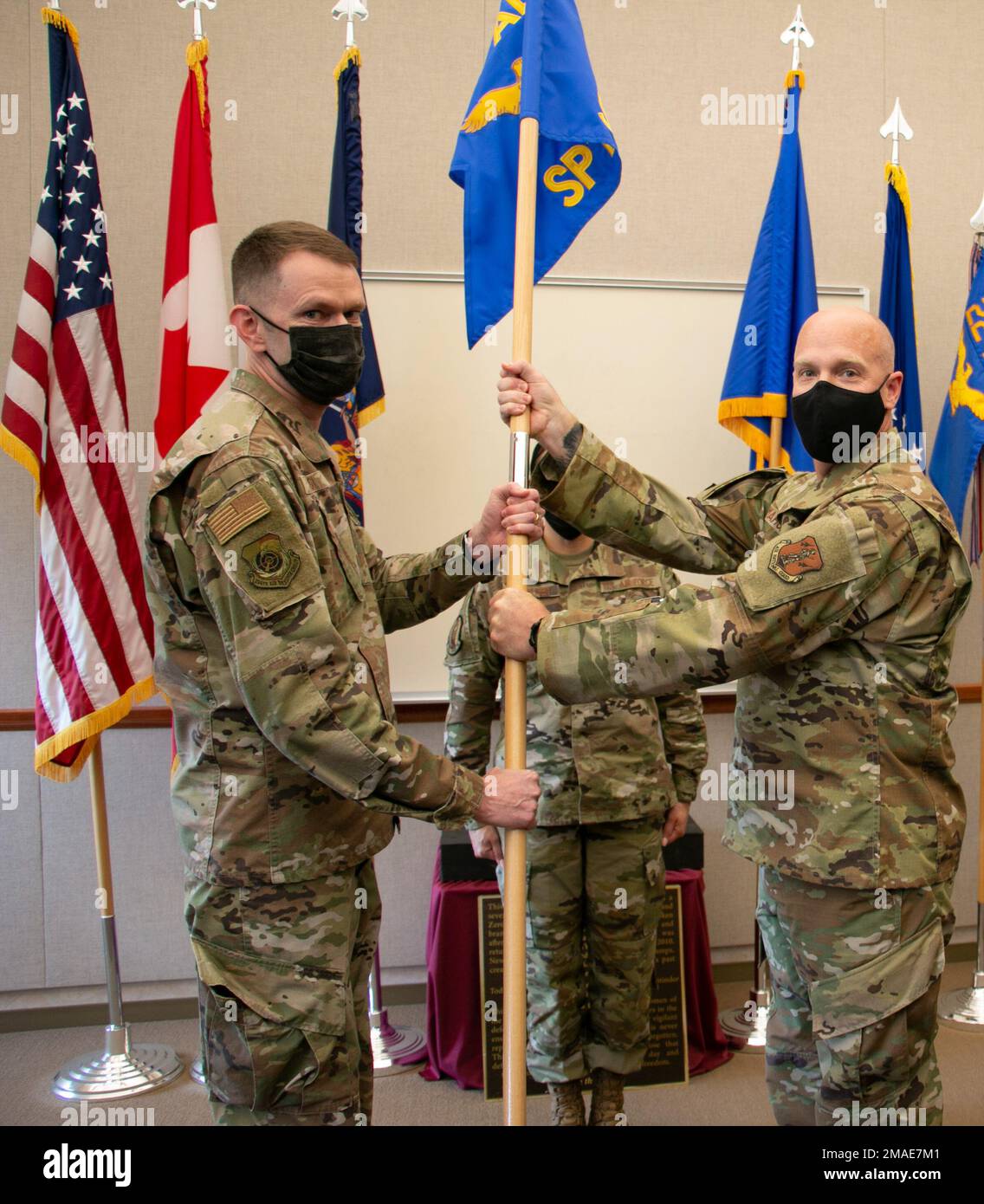 Lt. Col. Aaron Mahoney, right, received the 224th Support Squadron ...