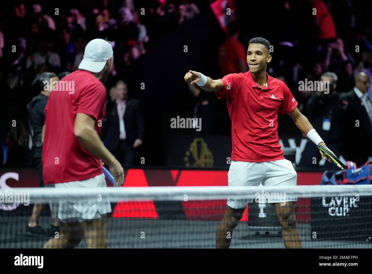 Team World's Jack Sock, right, and Felix Auger-Aliassime celebrate after winning a match against ...