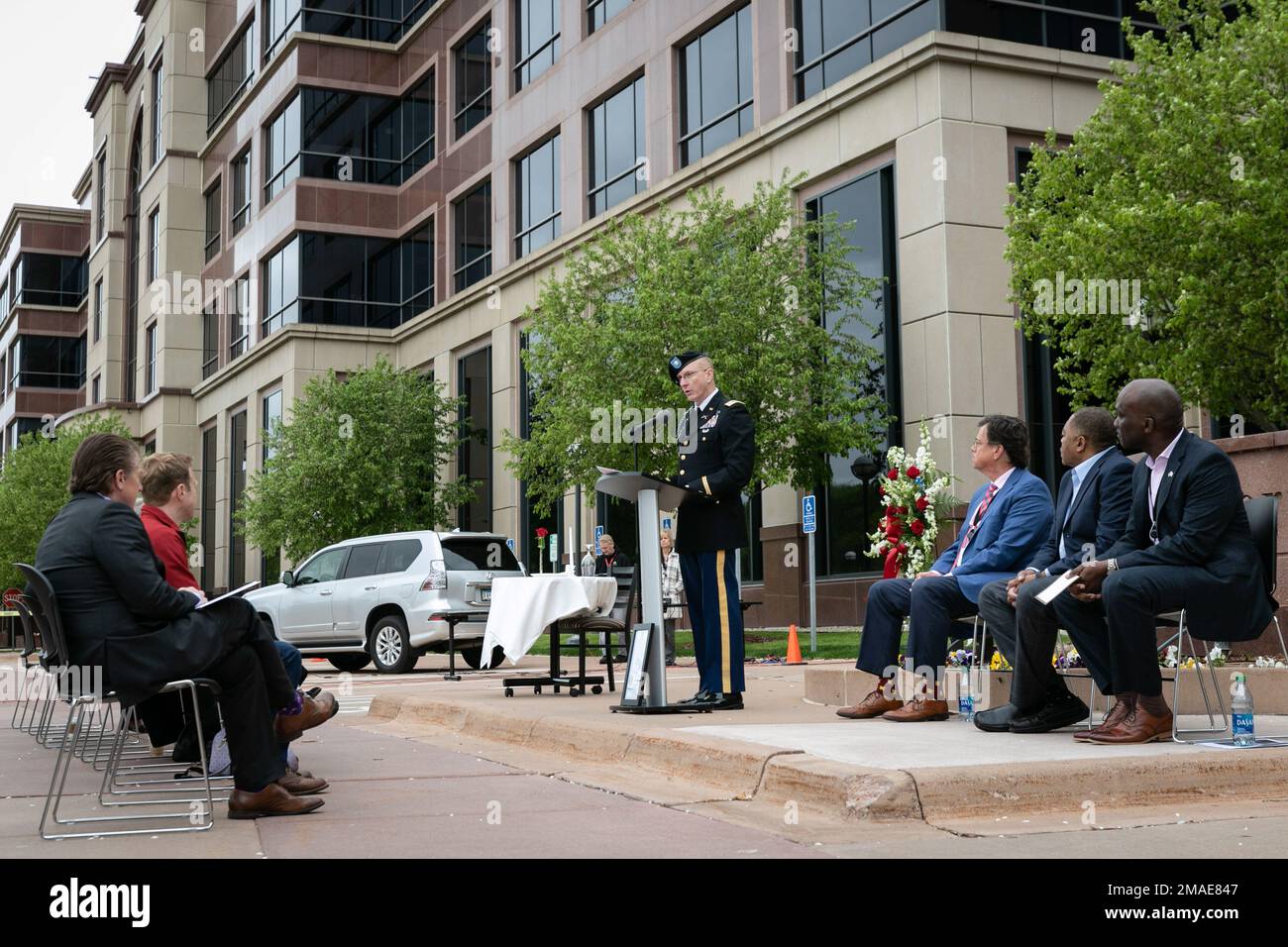 Lt. Col Jacob Helgestad speaks during a Memorial Day flag raising and ...