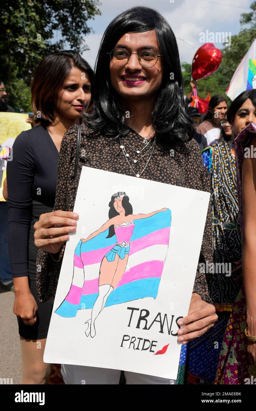 Members of the LGBTQ community and their supporters participate in a ...