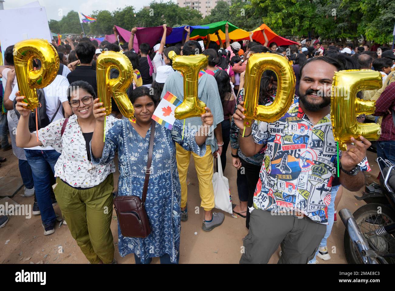 Members of the LGBTQ community and their supporters participate in a ...