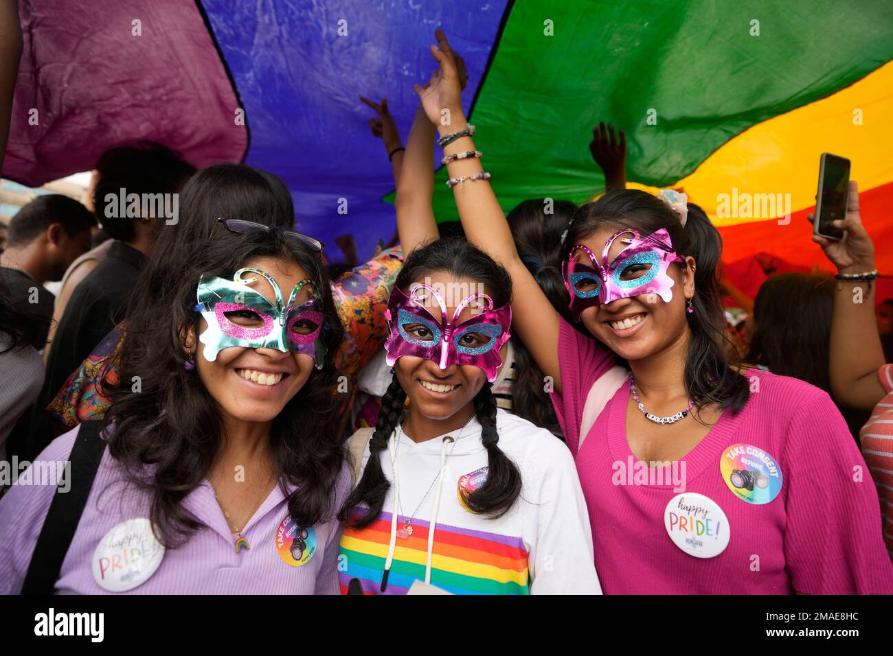 Members of the LGBTQ community and their supporters participate in a ...