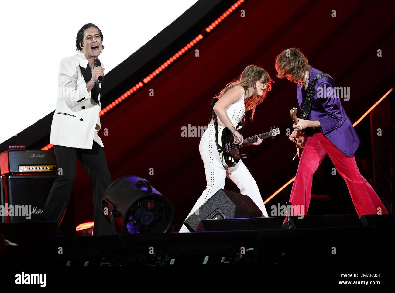 Damiano David, left, Victoria De Angelis and Thomas Raggi of Måneskin ...