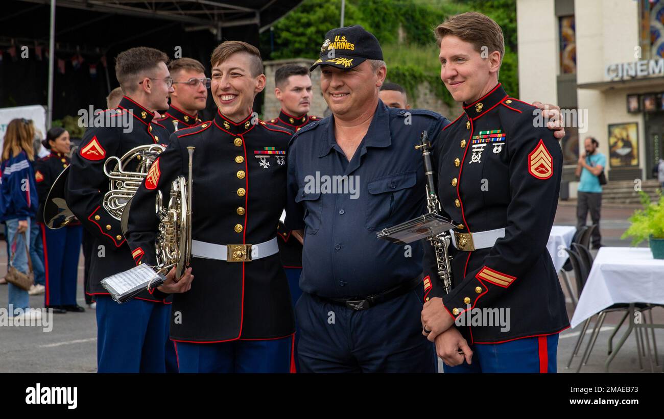 U.S. Marine Corps Sgt. Jessica Hubbell, a horn instrumentalist, left ...