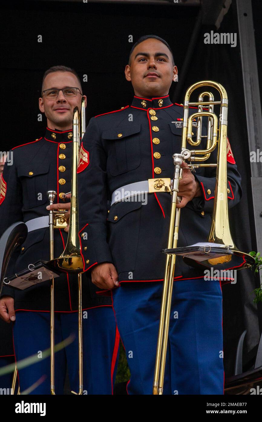 U.S. Marine Corps Cpl. Jeremy De La Cerda, a trombone instrumentalist ...