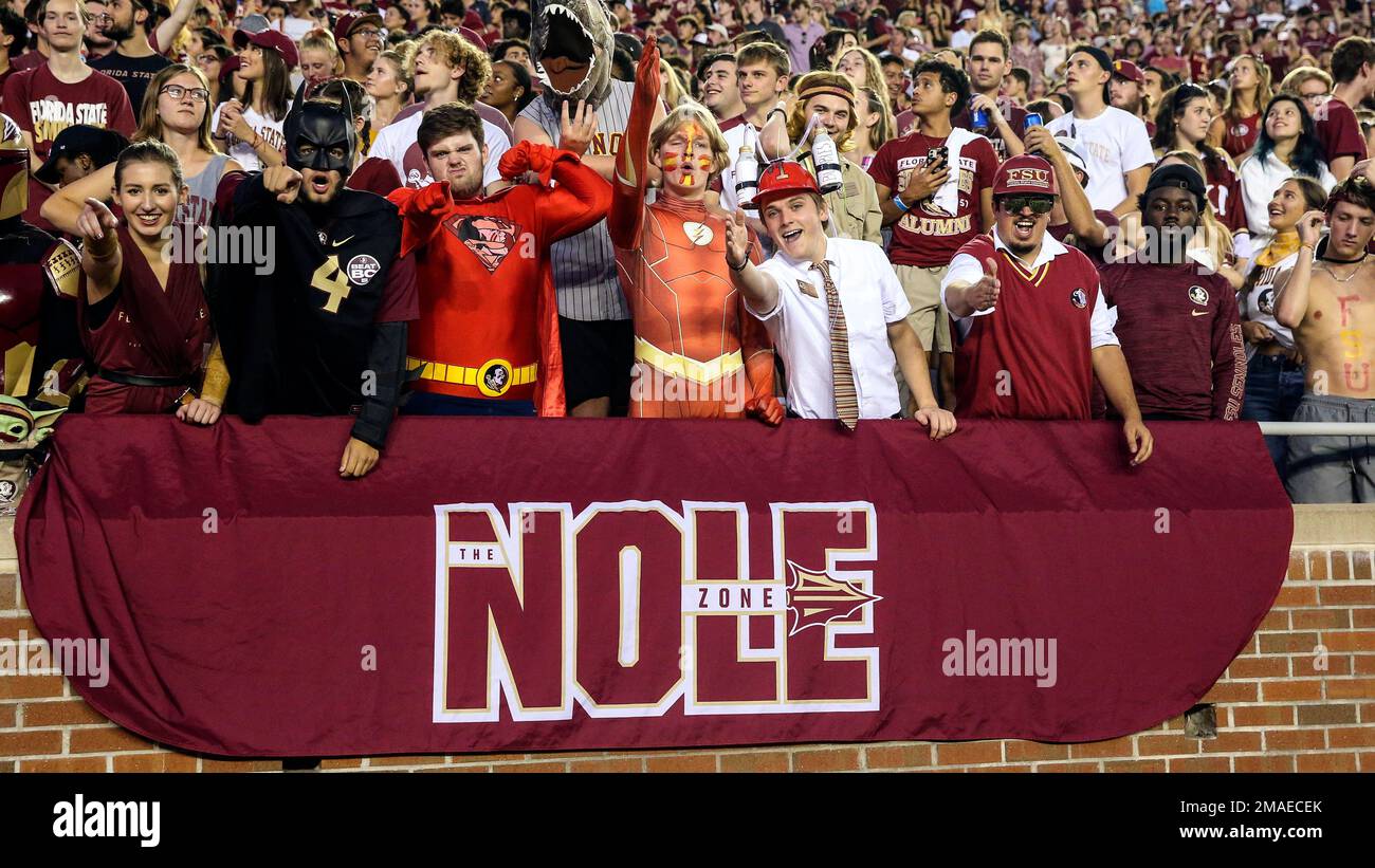 Florida State fans pose before an NCAA college football game against ...
